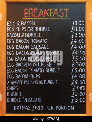 Full English breakfast dishes displayed on a menu in a market cafe ...