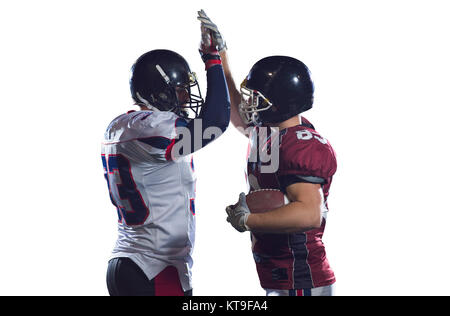 Happy Football Players Giving High Five At Field. Soccer Players High ...