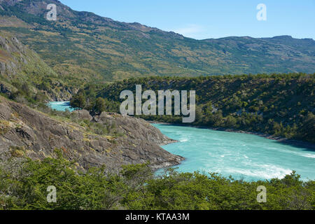 Blue glacial waters of the Rio Baker snaking through the lush ...