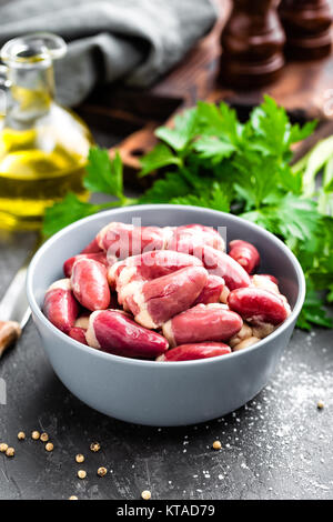 Closeup of fresh raw chicken hearts Stock Photo - Alamy