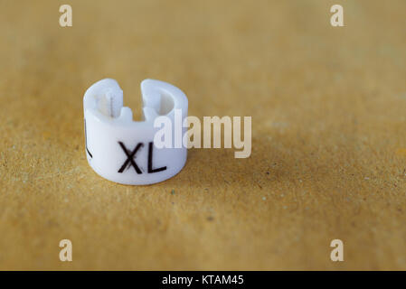 XL size tag with copy space on white background Stock Photo - Alamy
