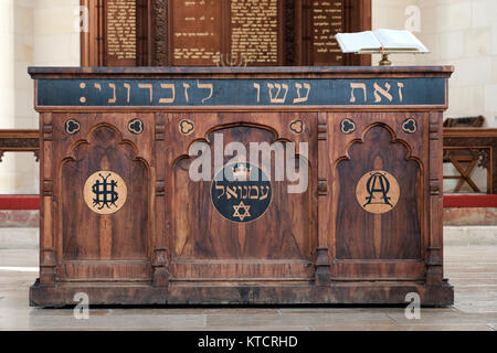 The wooden alter with Jewish symbols and verses in Hebrew inside the ...