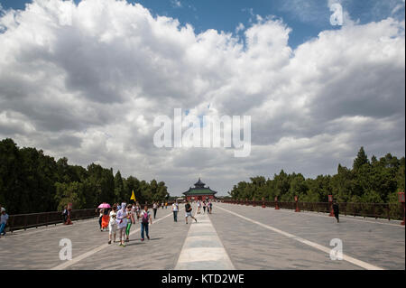 Tourists visit the Temple of Heaven Park and admire the magnificent ...
