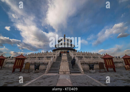Tourists visit the Temple of Heaven Park and admire the magnificent ...