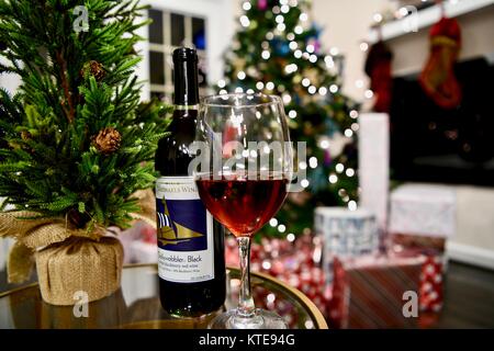 St. Michaels Winery Gollywobbler black wine on a table in a Christmas ...