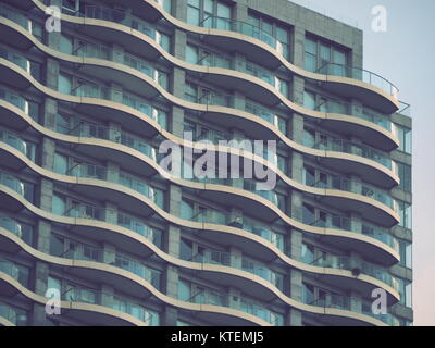 modern residence building facade with waves form balconies Stock Photo ...