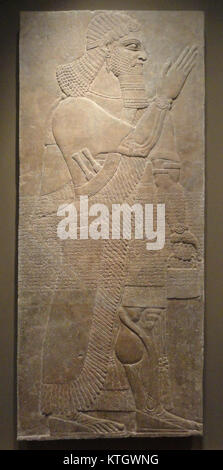 This Assyrian relief, displayed at the Hood Museum of Art, depicts a ...