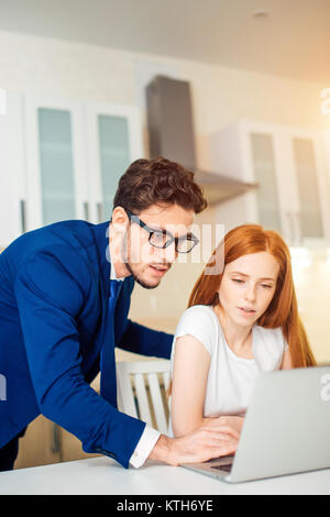 Happy business woman explaining something Stock Photo - Alamy