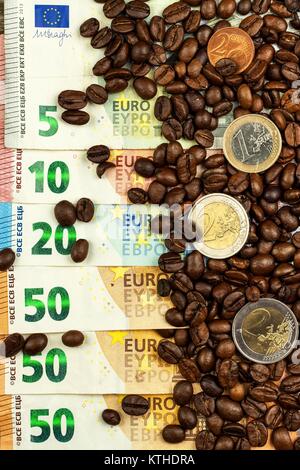 Roasted coffee beans and valid euro banknotes. Coffee trading. Sale of ...