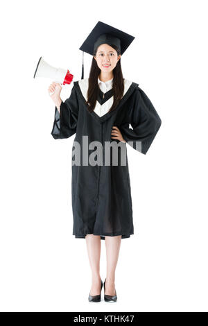 Female graduate shouting into megaphone on white background Stock Photo ...