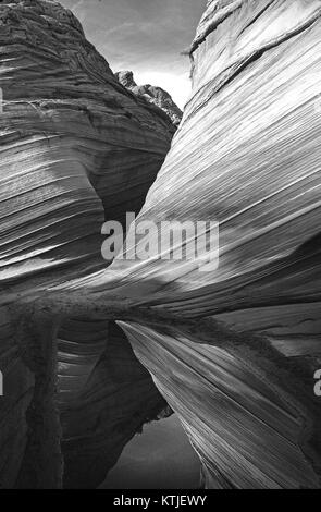 This image shows a geological feature known as a rock cut ...