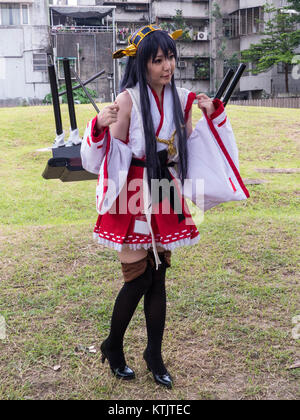 A cosplayer dressed as the Battleship Haruna Fleet Girl from the ...