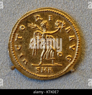 Coinage of ancient Roman coins made of metal on a retro press ...