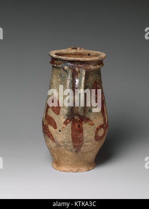 This jug, crafted from ceramic, represents functional pottery with ...