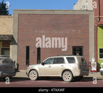 A historical photograph of O Street in Auburn, Nebraska, taken in 1920 ...