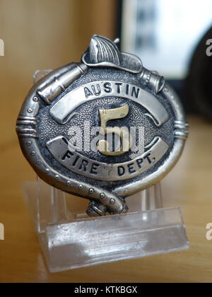 The badges from the Austin Fire Museum in Austin, Texas, represent the ...