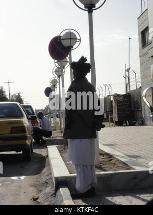 This portrait features a Baloch man from Birjand, Iran, wearing ...