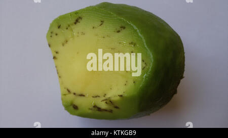 This image shows the flesh of an avocado, which is characterized by its ...