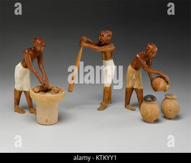 This tomb model from Meketre depicts a bakery and brewery scene ...