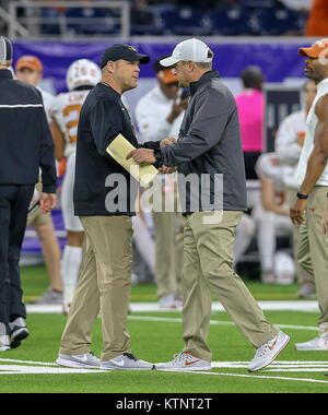 Texas head coach Tom Herman gives instructions to Texas tight end ...