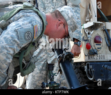 An Army mortarman assigned to Headquarters and Headquarters Company ...