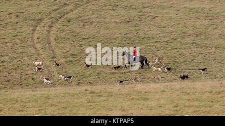 Riders pass over Salisbury Plain during the Tedworth Boxing Day hunt in ...
