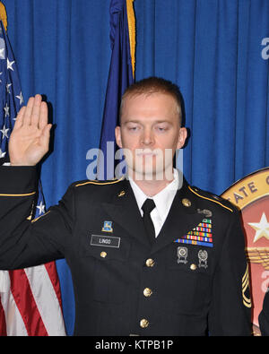 Newly appointed JAG officers recite their Oath of Office during a ...