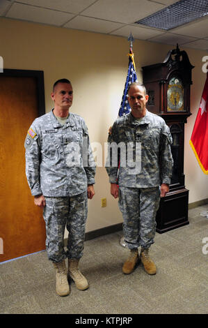 Maj. Gen. Patrick Murphy presents the Meritorious Service Medal to Lt ...