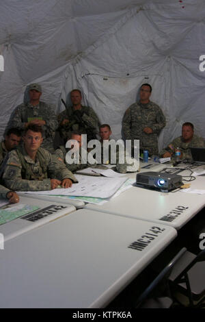 Soldiers host an air mission brief to coordinate the training exercise ...