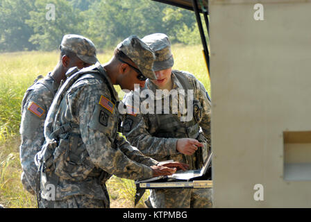 Soldiers of the 101st Signal Battalion operate a Satellite ...