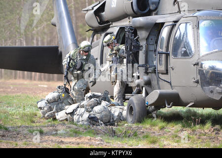 U.S. Soldiers assigned to the 108th Air Defense Artillery Brigade use a ...