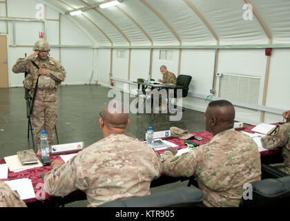 Spc. Jose Tejada, 313th Movement Control Battalion, reports to the ...