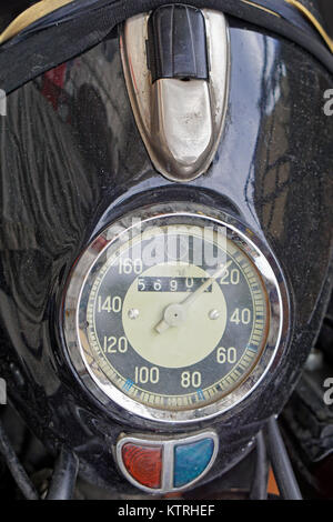 Classic vintage motorcycle speedometer at top of headlight Stock Photo ...