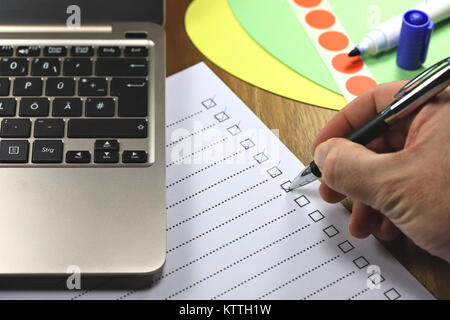 checklist being completed Stock Photo - Alamy