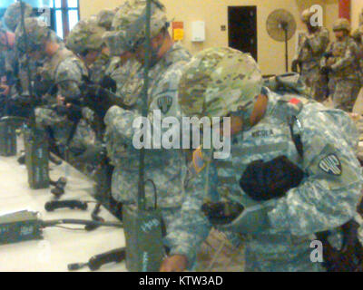 Signal Soldiers of the 369th Sustainment Brigade practice aligning a ...