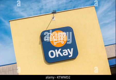 OKay supermarket logo on a Store. OKay is a neighbourhood stores ...