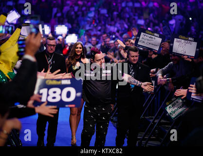 Peter Wright during the walk on during day sixteen of the William Hill ...