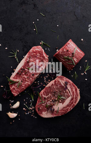 Overhead Shot Of Different Cuts Of Beef Steak On Background In Butcher ...