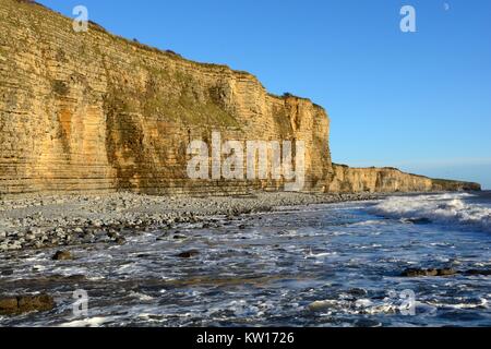 Limestone rock wave-cut platforms on a beach at Point Peron with algae ...