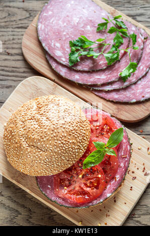 Sesame seed bun with homemade salami. Traditional german sandwich Stock ...