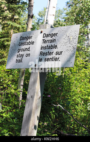 danger unstable ground sign on a metal fence Stock Photo - Alamy