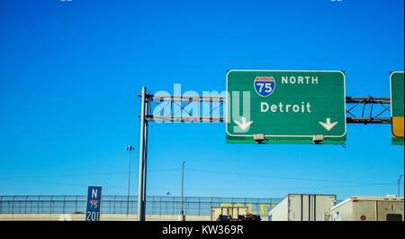 Detroit Michigan Interstate 75 north highway sign with sunrise sky ...