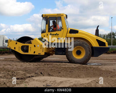 The Bomag BW211D is a heavy-duty compactor used in construction for ...