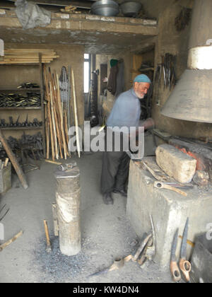 A historical depiction of a blacksmith in Nishapur, an ancient city in ...