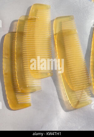 Set of brand new hand made horn comb Stock Photo - Alamy
