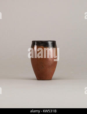 This jar, a fine example of historical pottery, features detailed ...
