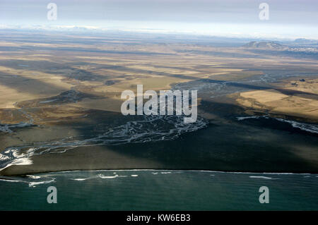 A network of Intertwining rivers on a river delta across a vast remote ...