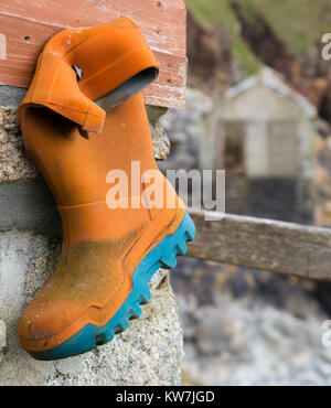 Orange Welly Boot Stock Photo - Alamy