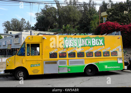 Gus's Lunch Box Mexican food cart yellow truck van parked at lunchtime ...