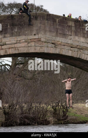 A man takes part in the Mappleton Bridge Jump, an annual unofficial ...